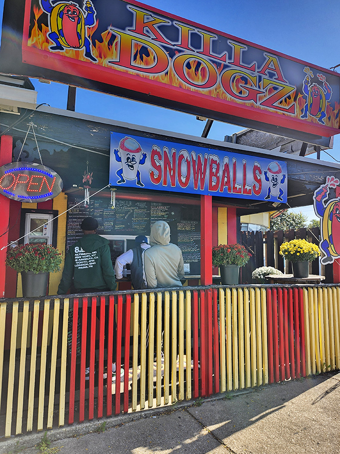 Those colors aren't lying—Killa Dogz serves up hot dogs with personality as bold as their red and yellow striped stand.