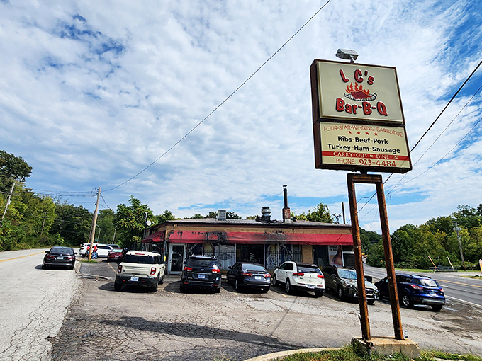 That roadside sign at LC's Bar-B-Q might as well say "BBQ Heaven Next Exit." Worth every mile of the journey.