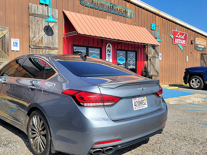 The weathered exterior and barn-style entrance promise authentic treasures within. Like your grandpa's workshop, but everything's for sale.
