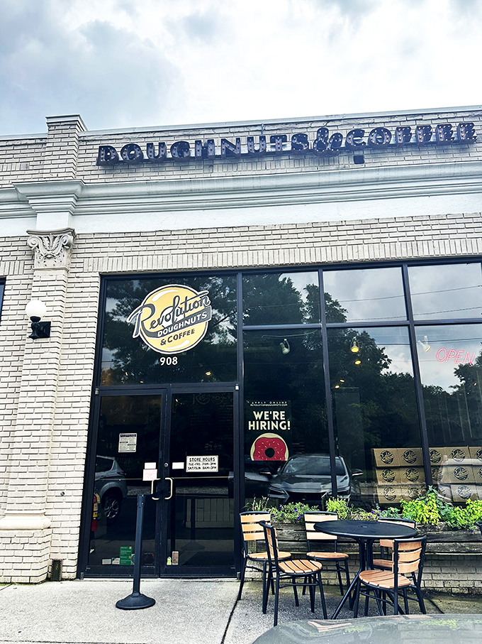 The historic "DOUGHNUT & COFFEE" lettering above Revolution's entrance feels like stepping into a tastier version of the past.