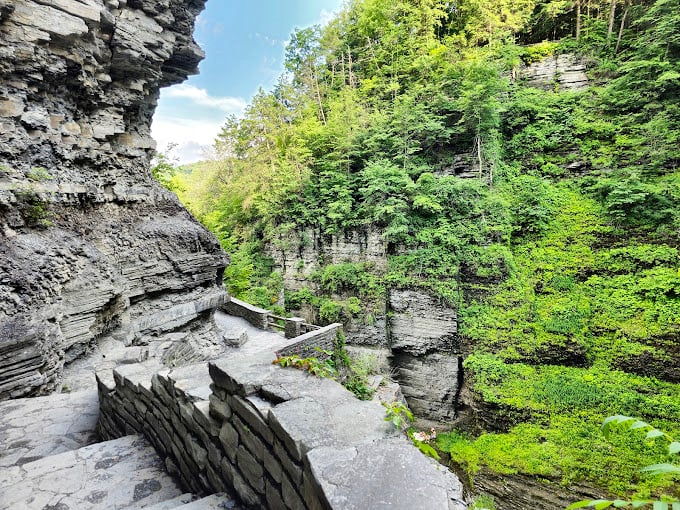 Who needs an expensive spa when you can cross this rustic bridge and let nature's mist give you the facial of a lifetime?
