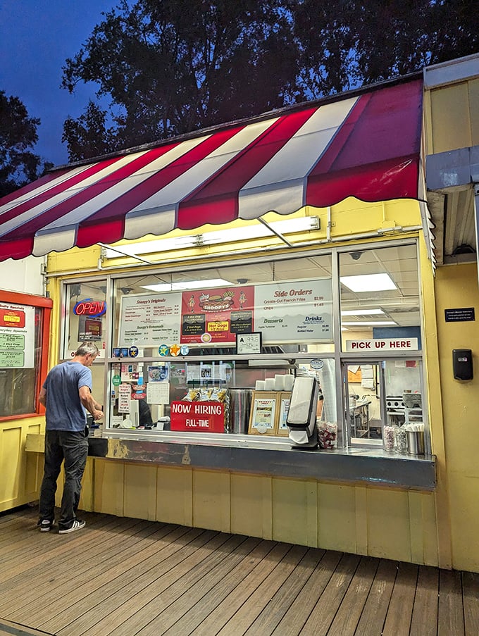 The classic drive-up design at Snoopy's feels like a time machine to simpler days when lunch didn't require a reservation.
