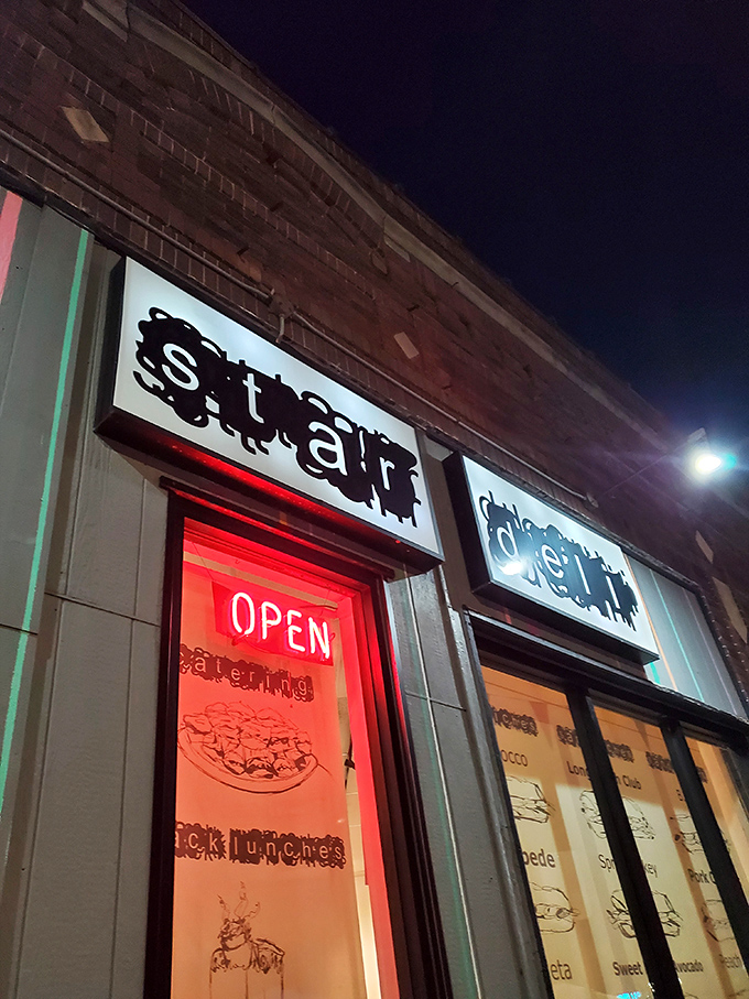 By night, Star Deli's neon glow beckons sandwich pilgrims like a lighthouse guiding hungry ships to safe harbor.
