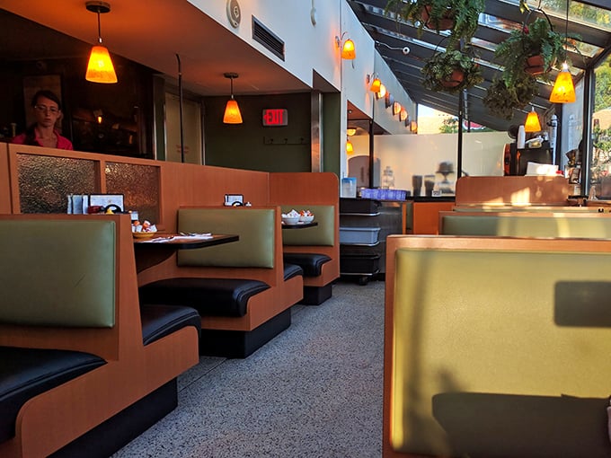 Cozy booths and warm lighting create the perfect backdrop for eggs and conversation at The Clique &ndash; where breakfast is serious business.