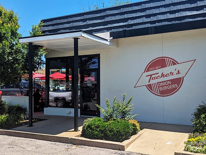 Tucker's Onion Burgers: Where simplicity meets perfection. That red logo promises a flavor explosion that delivers every time.