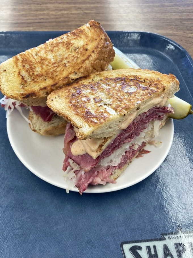 "The Reuben in its natural habitat&mdash;accompanied by a pickle spear sentinel and mac & cheese that's achieved comfort food nirvana." 