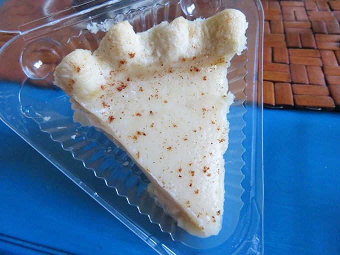 This isn't just pie—it's edible architecture. The creamy filling and perfect spice dusting create a masterpiece worthy of the Louvre.