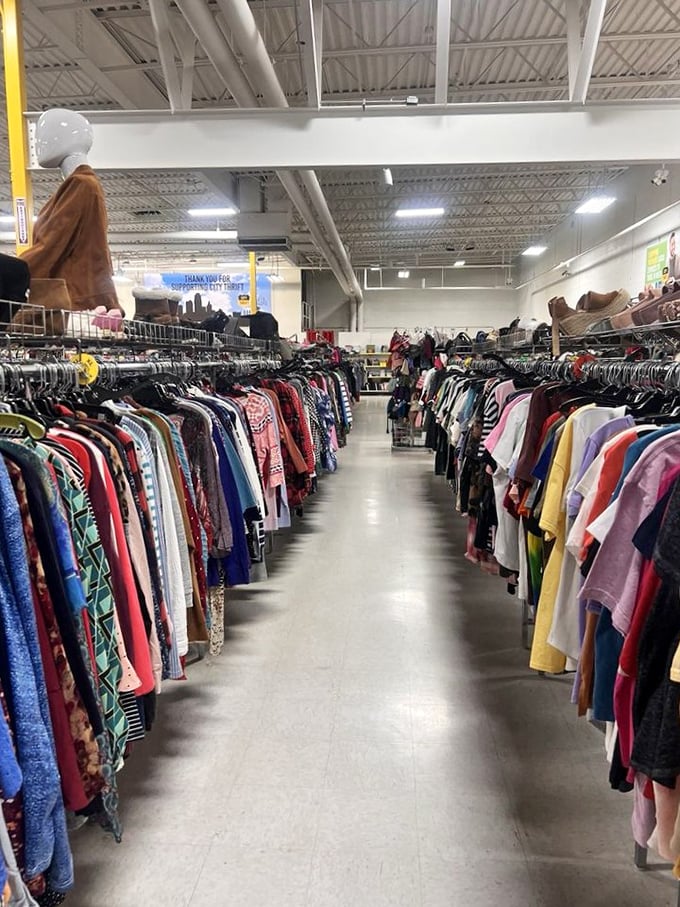 Clothing aisles stretch toward the horizon like a textile Grand Canyon. That perfect vintage shirt is hiding somewhere in this glorious chaos.