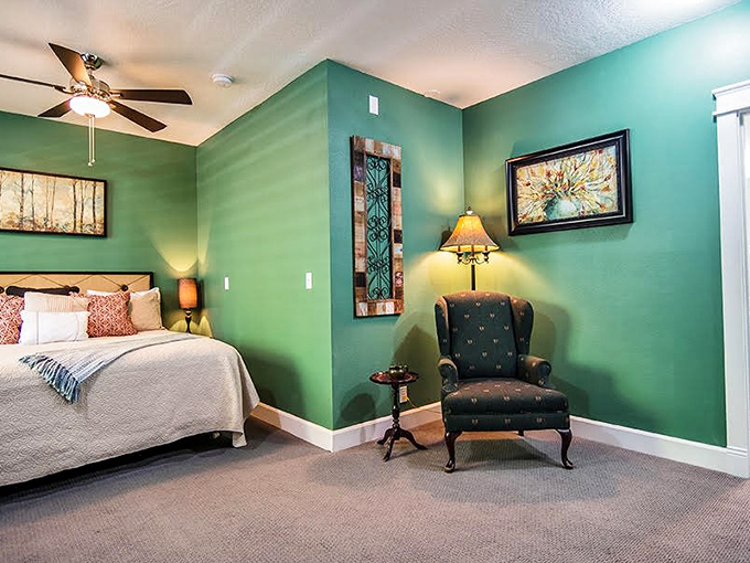 This regal four-poster bed with its royal purple spread isn't just sleeping quarters&mdash;it's a Victorian fantasy where you half-expect Maggie Smith to deliver a cutting remark. 