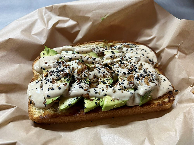 This isn't just avocado toast &ndash; it's a masterclass in simplicity. Creamy avocado, perfectly toasted bread, and those seeds adding texture like nature's sprinkles. 