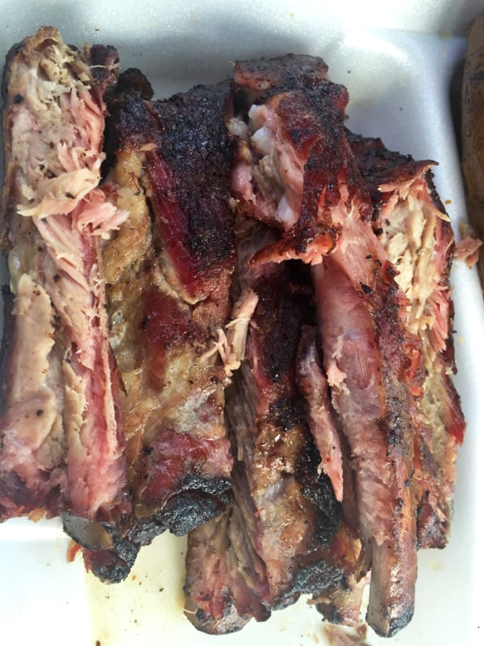 These ribs aren't just falling off the bone &ndash; they're practically volunteering to jump onto your plate with their glistening, smoke-kissed exterior.