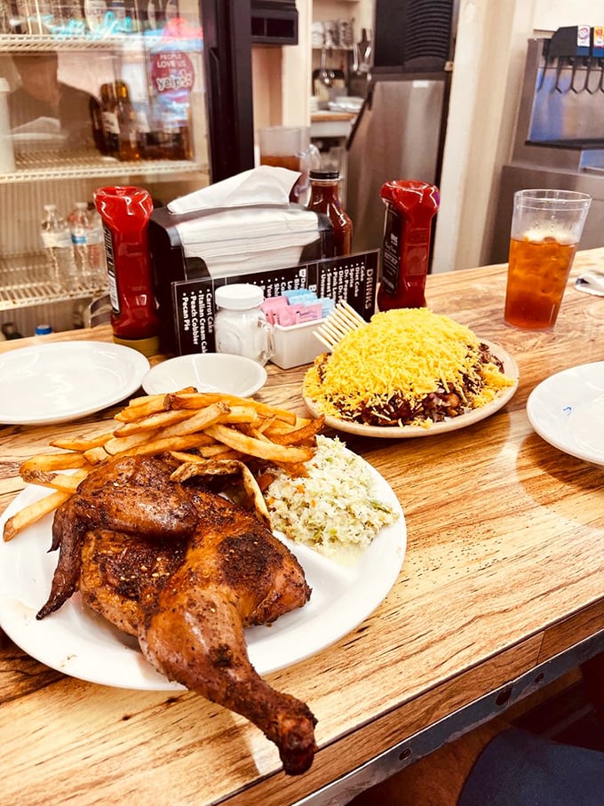 Half a hickory-smoked chicken with that mahogany skin&mdash;the kind of plate that makes vegetarians nervously reconsider their life choices.