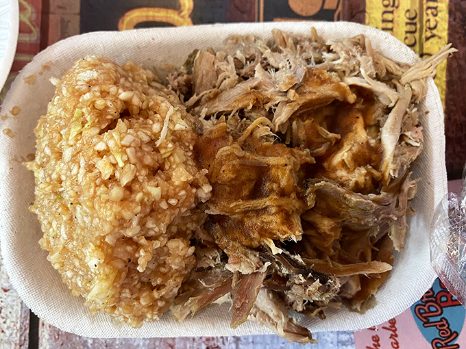 Pulled pork with that perfect smoke ring sitting beside a golden hushpuppy&mdash;a North Carolina duet that puts most musical collaborations to shame.
