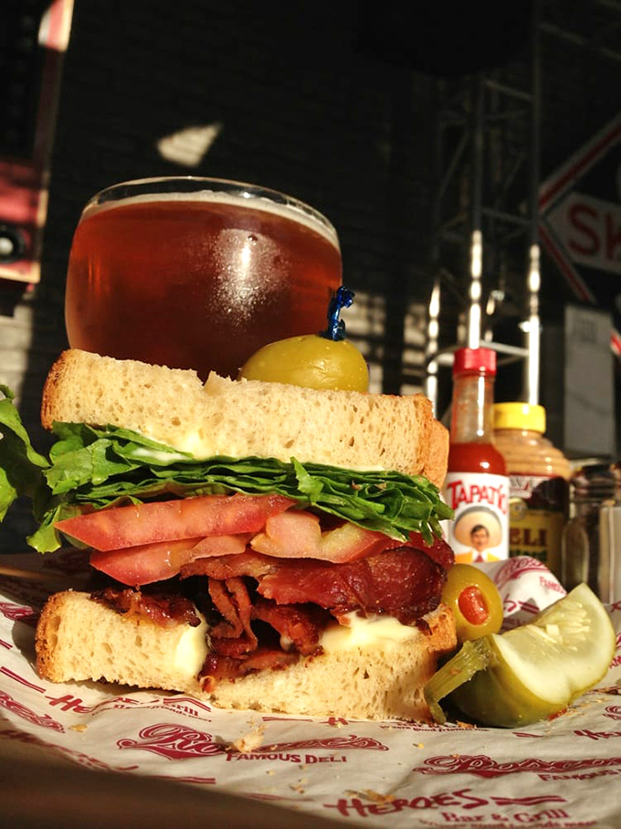 Behold the BLT in its natural habitat&mdash;alongside a craft beer. The bacon's thickness suggests it wasn't so much sliced as strategically carved by someone who respects pork.
