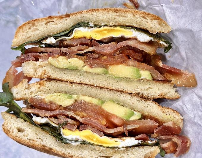 This isn't just breakfast&mdash;it's morning salvation. Layers of avocado, bacon, and egg create a sandwich worth setting your alarm for. 