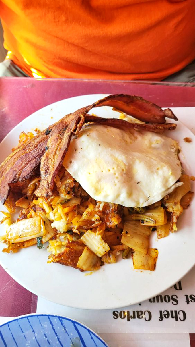 A Korean feast hiding in a breakfast joint: tender bulgogi, steamed rice, and fresh vegetables create a colorful cultural conversation on a plate.