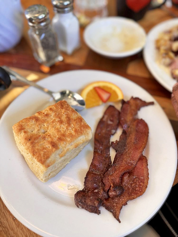 That biscuit isn't just golden&mdash;it's the breakfast equivalent of striking oil. Paired with perfectly crisped bacon, it's Virginia's morning gold standard.