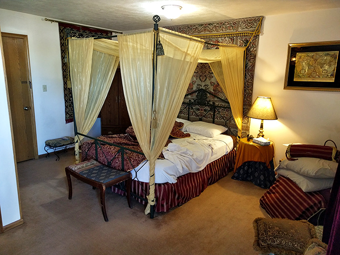 Forget cookie-cutter hotel rooms&mdash;this canopied bed with rich tapestries makes you feel like a traveling dignitary in an exotic land.