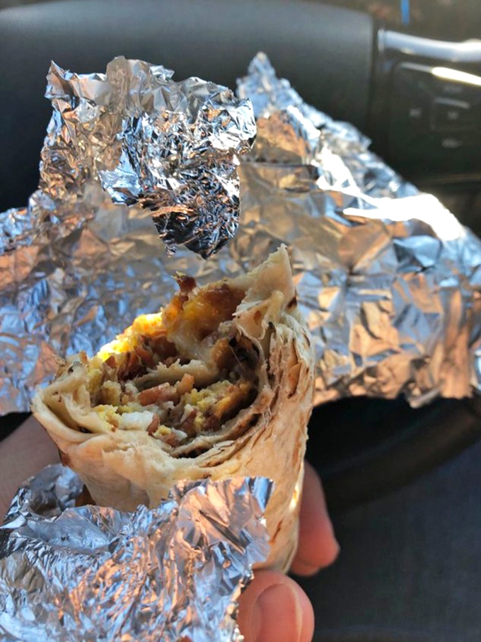 Foil-wrapped perfection! This breakfast burrito isn't just a meal, it's morning salvation rolled up with the care of a Swiss watchmaker.