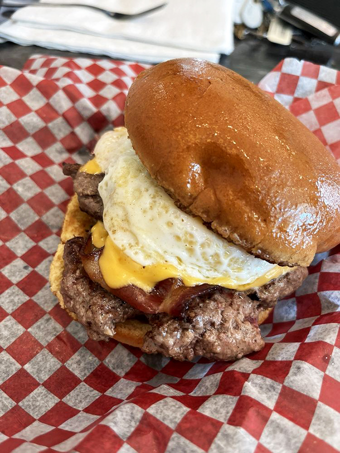 The Brunch Burger doesn't just break the rules, it rewrites them. That sunny-side-up egg creates a sauce that should be bottled and sold.