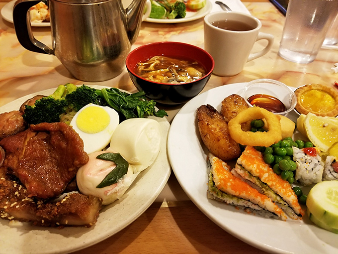 A plate that tells the story of buffet strategy &ndash; a little of this, a lot of that, and absolutely no regrets about that sesame chicken.