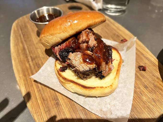 Not all heroes wear capes; some come on toasted buns with perfectly caramelized burnt ends that collapse into tender submission with each heavenly bite.