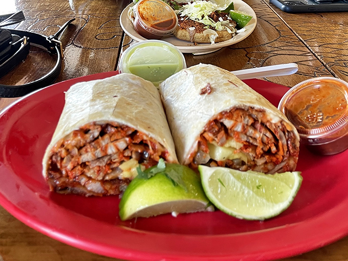 This burrito isn't just a meal, it's an event. The cross-section reveals the perfect architecture of flavor that keeps devotees coming back.