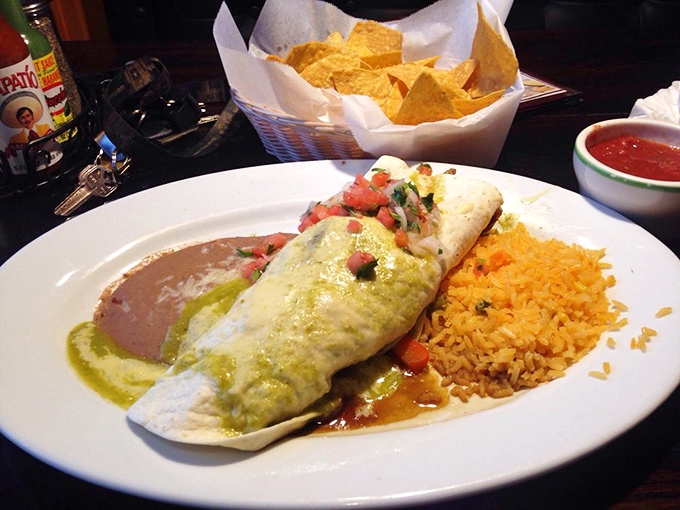 This burrito doesn't just arrive at your table&mdash;it makes an entrance. Draped in green sauce with a side of perfectly orange rice, it's comfort food wearing its Sunday best.