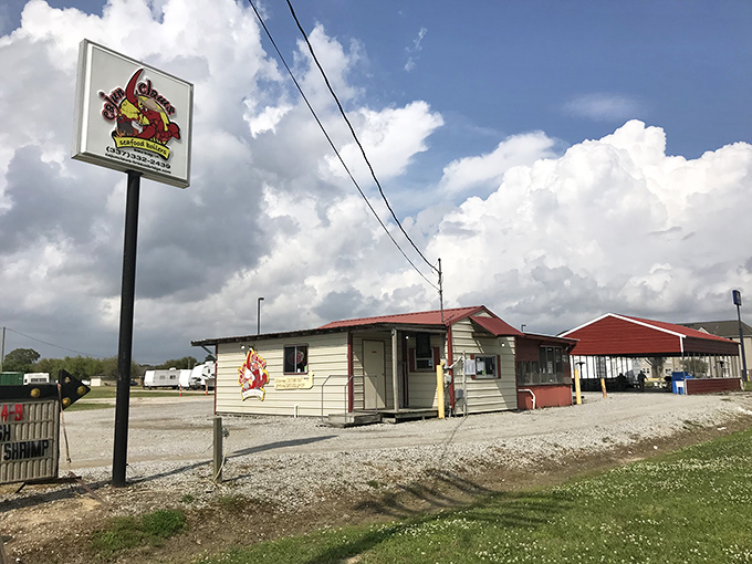 A giant crawfish guards the entrance to Cajun Claws like a delicious sentinel, promising the kind of seafood feast worth traveling miles for.