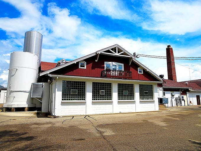 A picture-perfect historic train depot transformed into a visitor center, blooming with flowers that somehow look even more vibrant against Wisconsin's summer sky.
