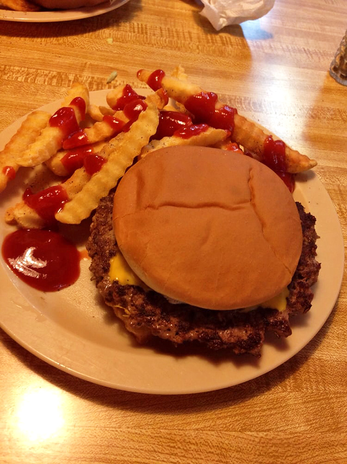 This isn't just a cheeseburger&mdash;it's edible poetry. The melted cheese cascades over a perfectly grilled patty in a dance as old as American cuisine itself.