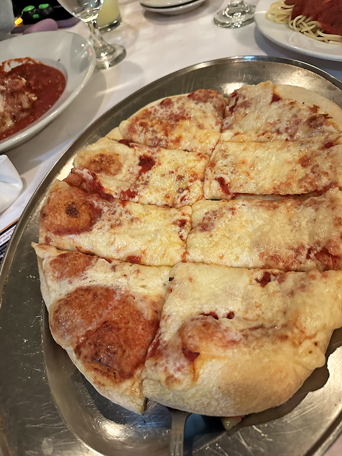 This isn't just cheese pizza &ndash; it's a love letter to simplicity. The kind of straightforward deliciousness that makes you question why anyone needed to invent toppings.