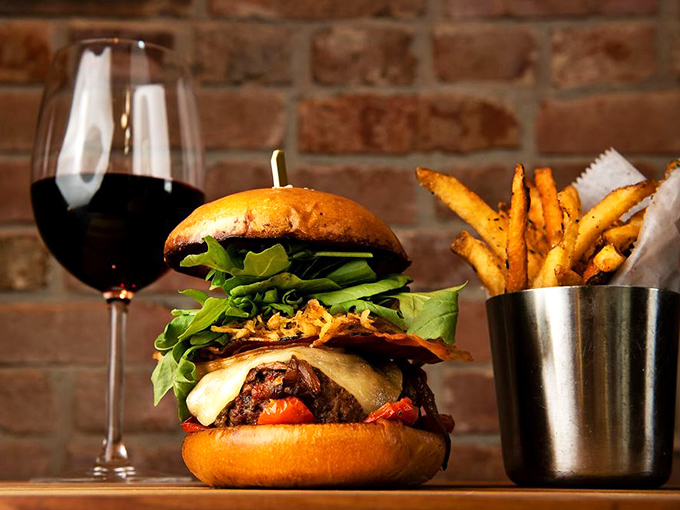 This isn't just a burger&mdash;it's an architectural marvel of beef and cheese that requires both hands and zero shame.