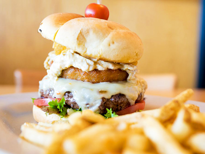 Behold the tower of power! This burger doesn't just come with an onion ring&mdash;it wears it like a crown.