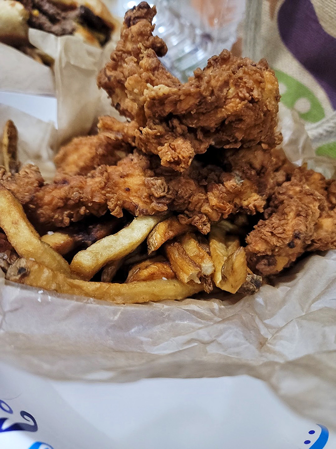 This omelet doesn't just come with cheese &ndash; it's been smothered, covered, and completely seduced by it. Those home fries aren't bad company either. 