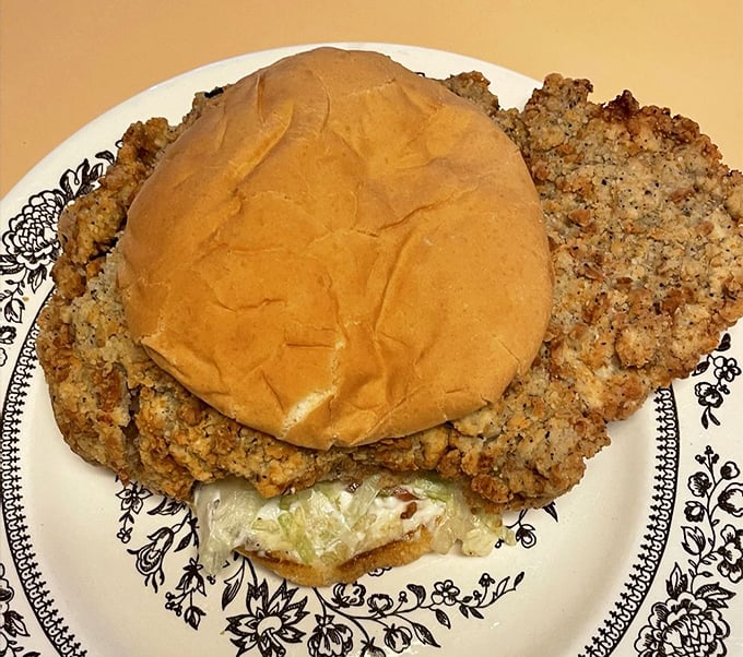 Behold the star of the show: a chicken fried steak sandwich so massive it makes other sandwiches feel inadequate.