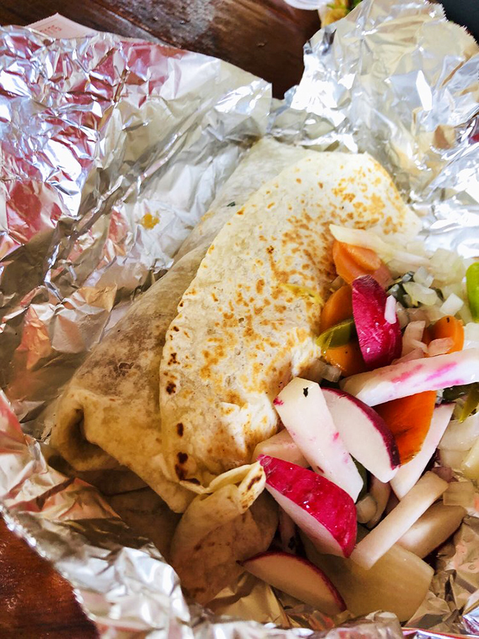 These street tacos aren't just food&mdash;they're edible art, with each lime wedge and cilantro sprig playing a crucial supporting role to the star proteins.