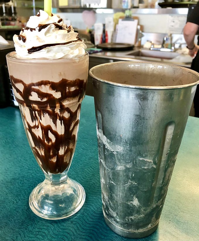 This chocolate milkshake isn&rsquo;t just rich&mdash;it&rsquo;s a full-on sweet rebellion, with whipped cream flair and a frosty steel sidekick