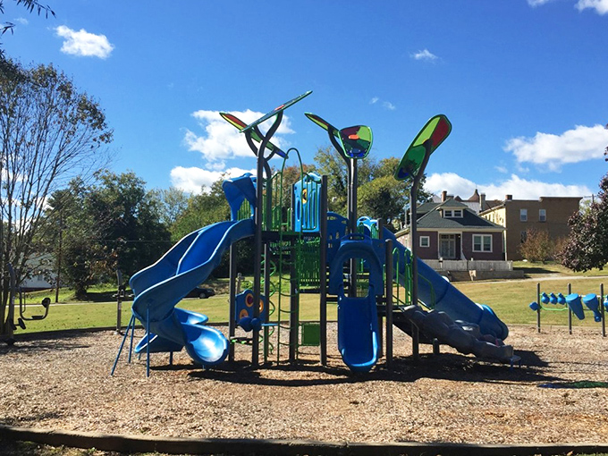 Grandkids visiting? This colorful playground offers priceless memories without the premium price tag of big-city parks. The laughter comes free of charge!