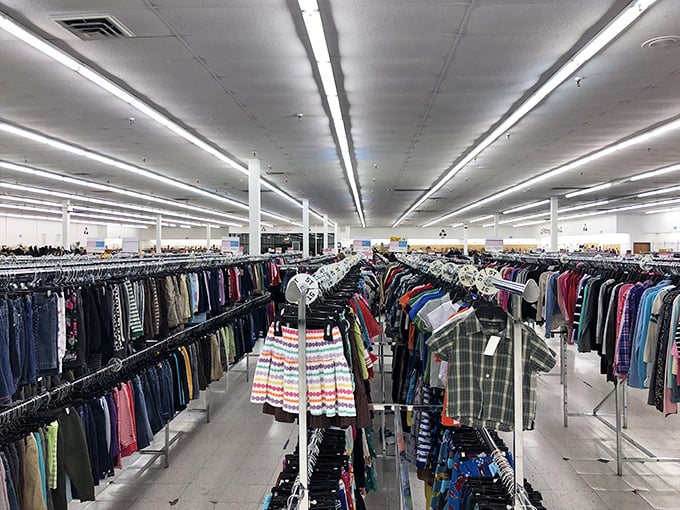 A textile ocean where fashion goes for its second act. These color-coded clothing racks contain everything from everyday basics to "how did someone give THIS up?" designer finds.