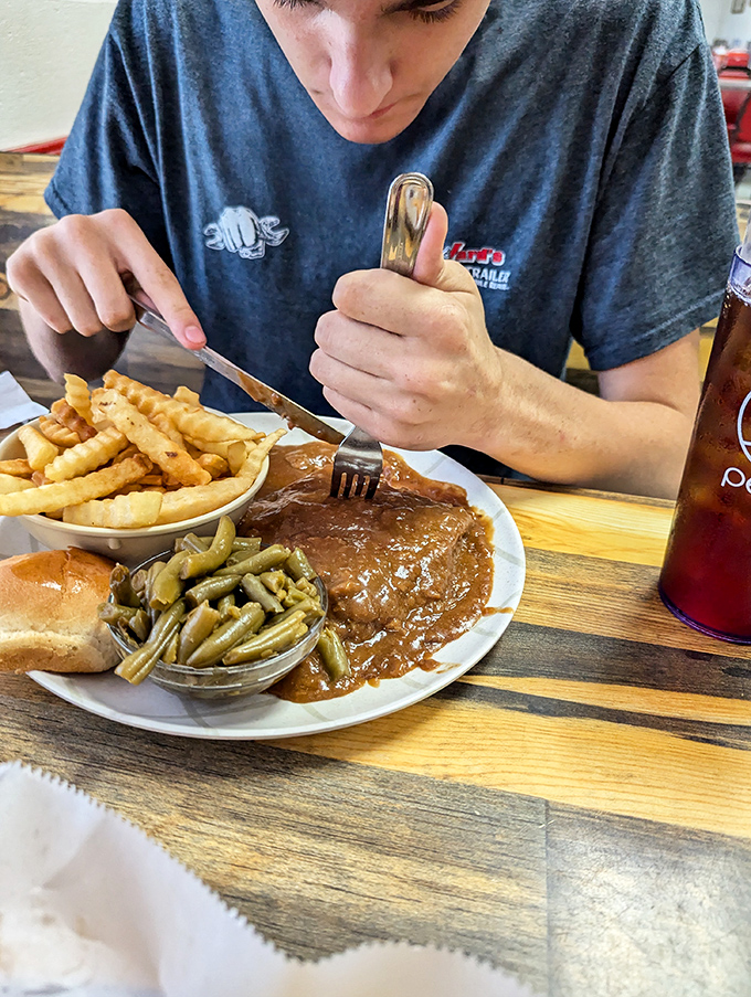 That country fried steak isn't just dinner&mdash;it's therapy on a plate, smothered in gravy that could solve most of life's problems.