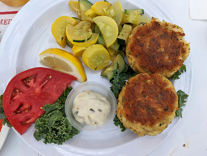 Golden-brown perfection that would make Neptune himself weep with joy. These crab cakes are what seafood dreams are made of—mostly crab, minimal filler.
