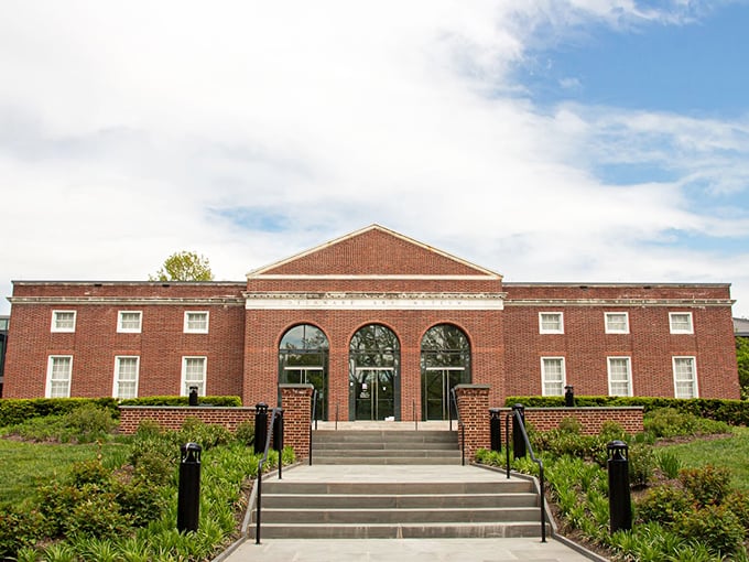 Grand entrance, grander history. These eagle-topped gates welcome visitors to a world where American industry and artistry converged to create something magnificent. 