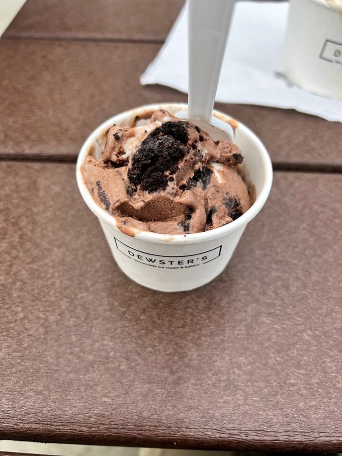 This cookies and cream masterpiece in a freshly made waffle cone isn't just dessert&mdash;it's architecture you can eat. Structural integrity never tasted so good. 