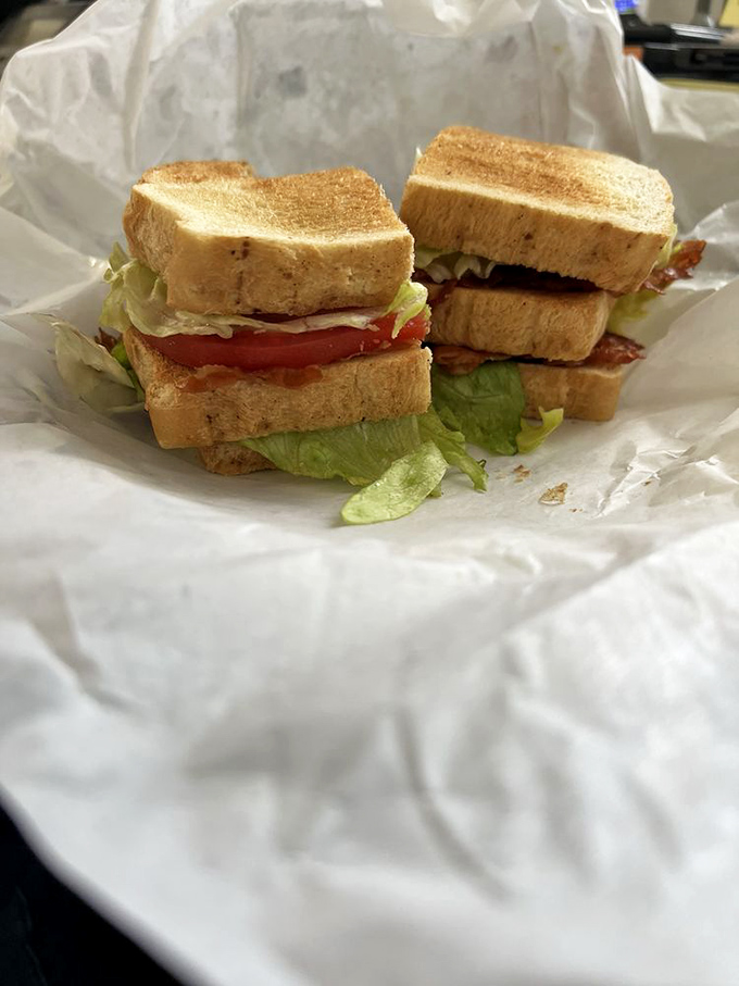 This BLT isn't just a sandwich&mdash;it's architecture. Perfect toast, garden-fresh veggies, and bacon that would make vegetarians question their life choices.