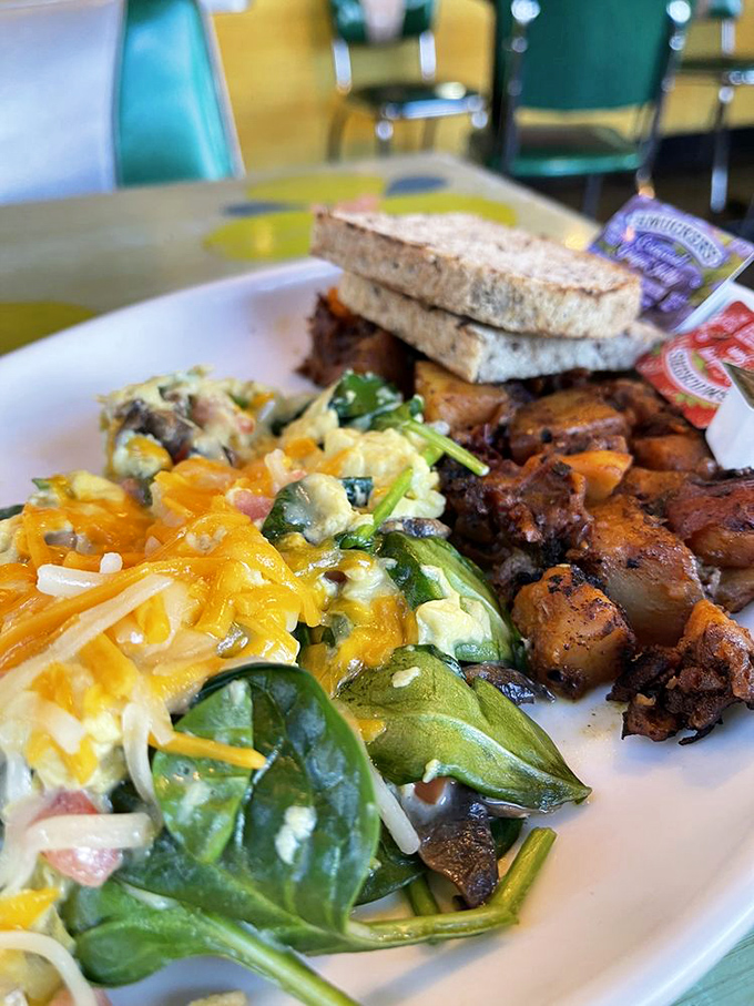 The Spring Egg isn't just breakfast, it's performance art. Perfectly cooked eggs rest atop prosciutto and spinach like they've found their rightful throne.