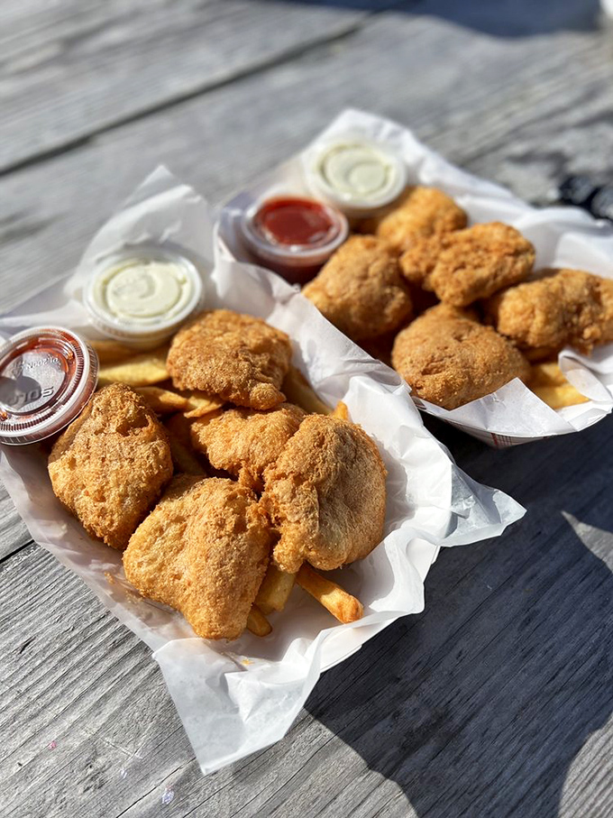 Golden chunks of albacore tuna nestled beside perfectly crisp fries. This isn't just fish and chips&mdash;it's edible sunshine that makes even Oregon's rainy days brighter. 