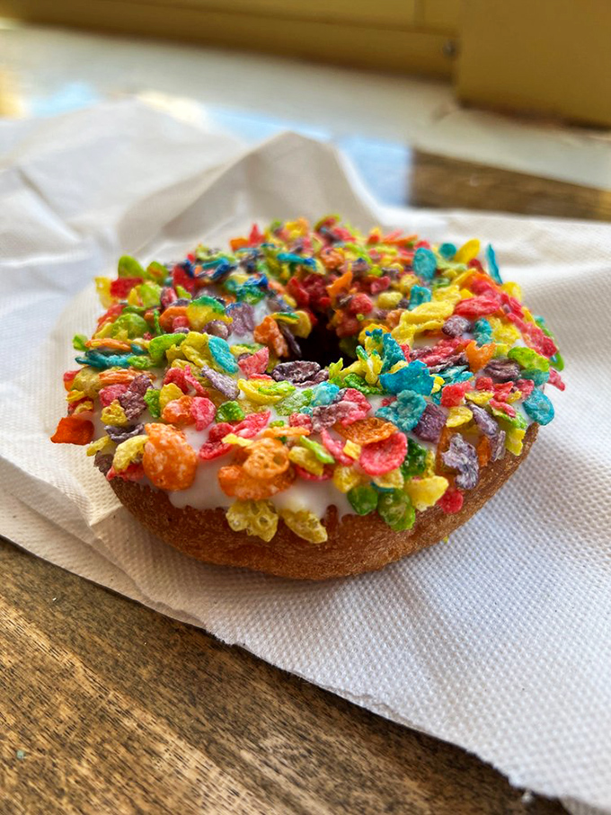 Fruity Pebbles aren't just for breakfast anymore! This donut brings childhood cereal nostalgia to adulthood with a frosted canvas that Fred Flintstone would demolish in seconds.