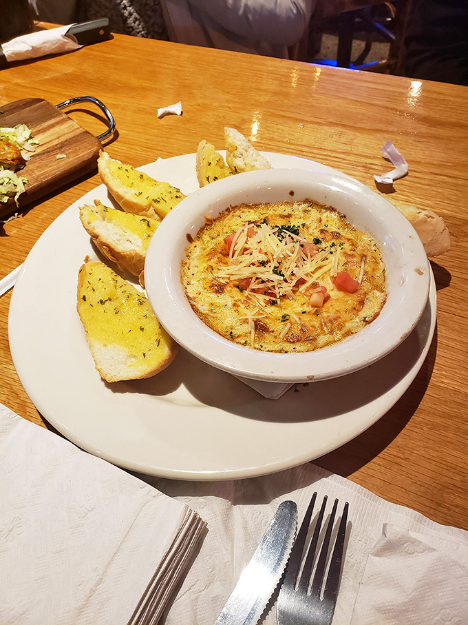 This French onion soup isn't just a dish&mdash;it's a life event. That golden cheese crown stretches dramatically with each spoonful, like the finale of a culinary opera.