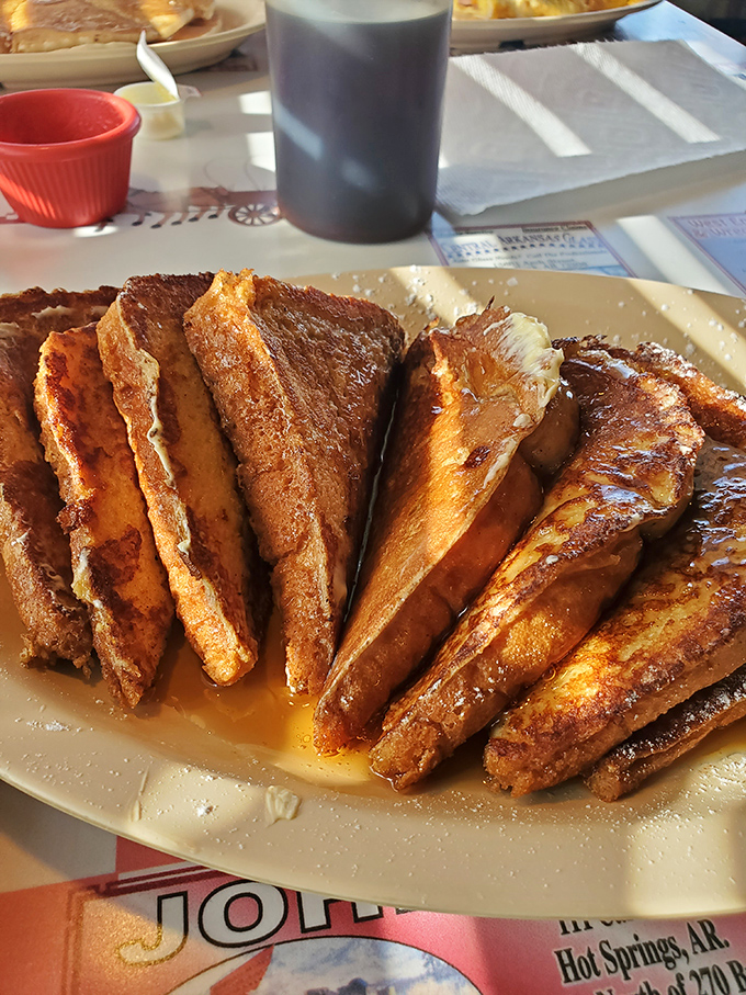 French toast that doesn't just flirt with perfection&mdash;it's in a committed relationship. Golden-brown, dusted with powdered sugar, and crowned with a glistening pineapple ring.